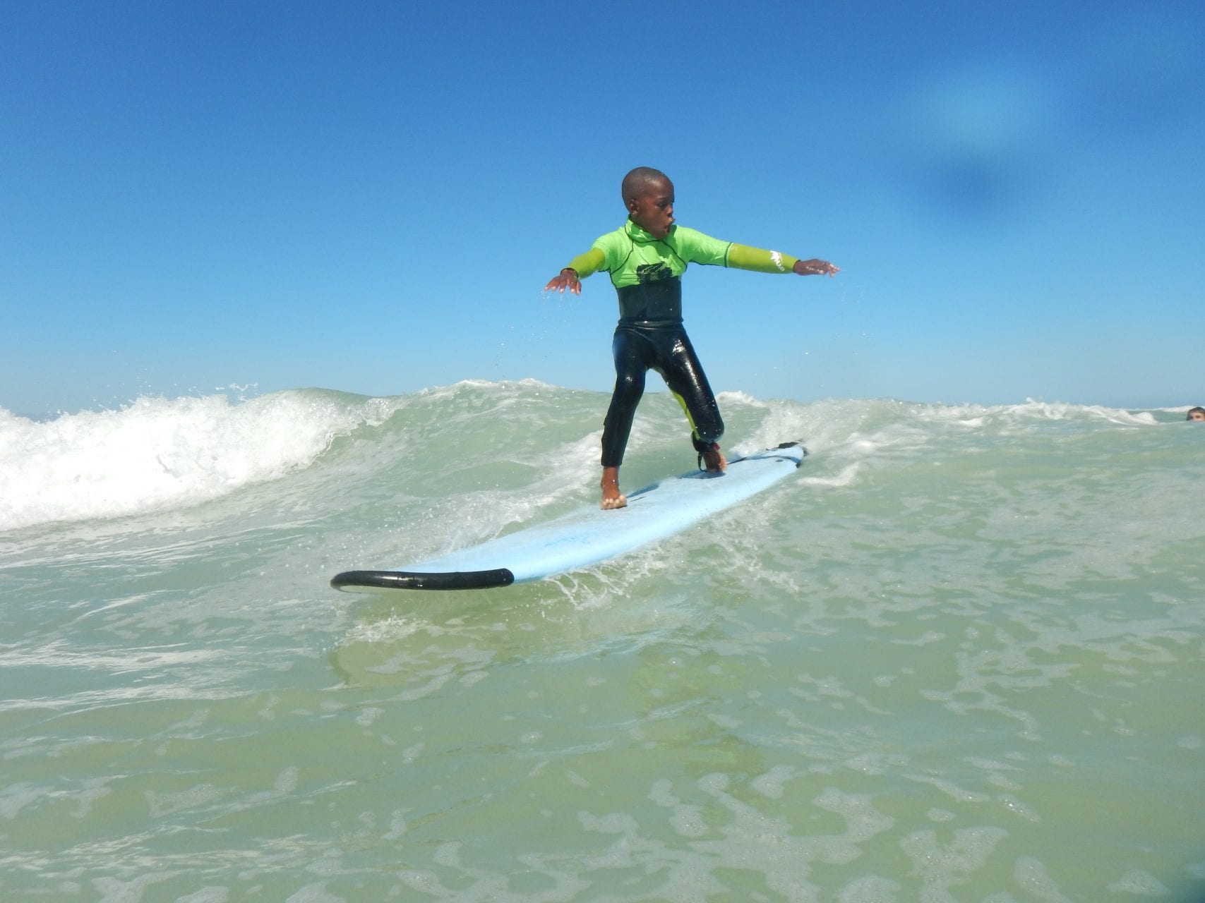Marine Explorer surfing a wave - SOSF Shark Education Centre